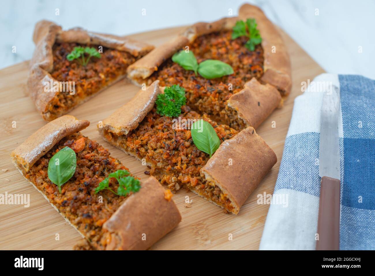 Traditional Turkish flatbreads known as kasarli sucuklu pide Stock ...