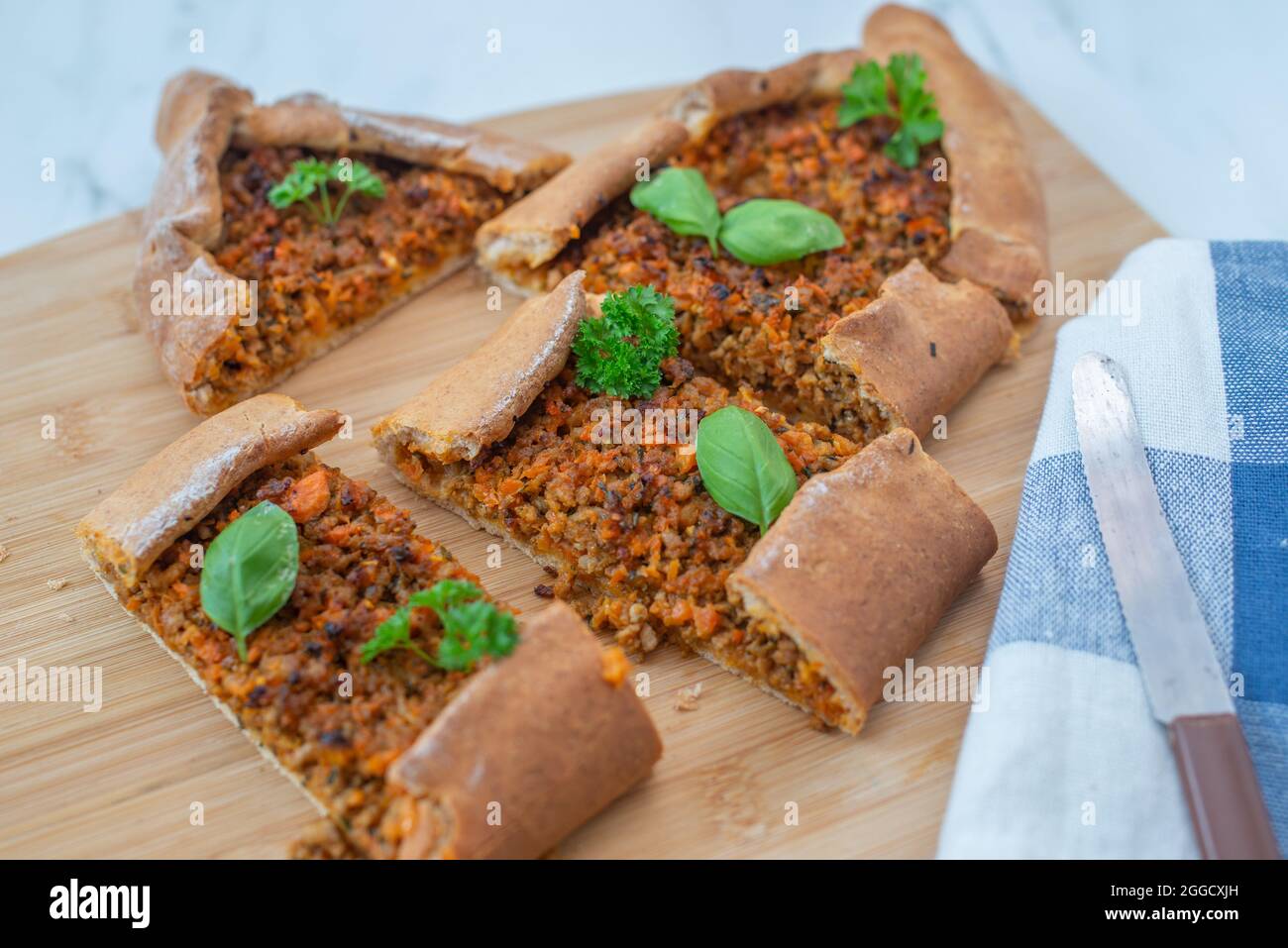 Traditional Turkish flatbreads known as kasarli sucuklu pide Stock ...