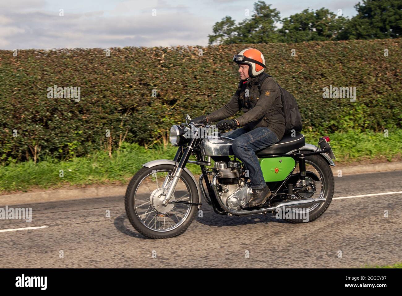 1958 50s green Matchless 600cc motorcycle & rider en-route to ...