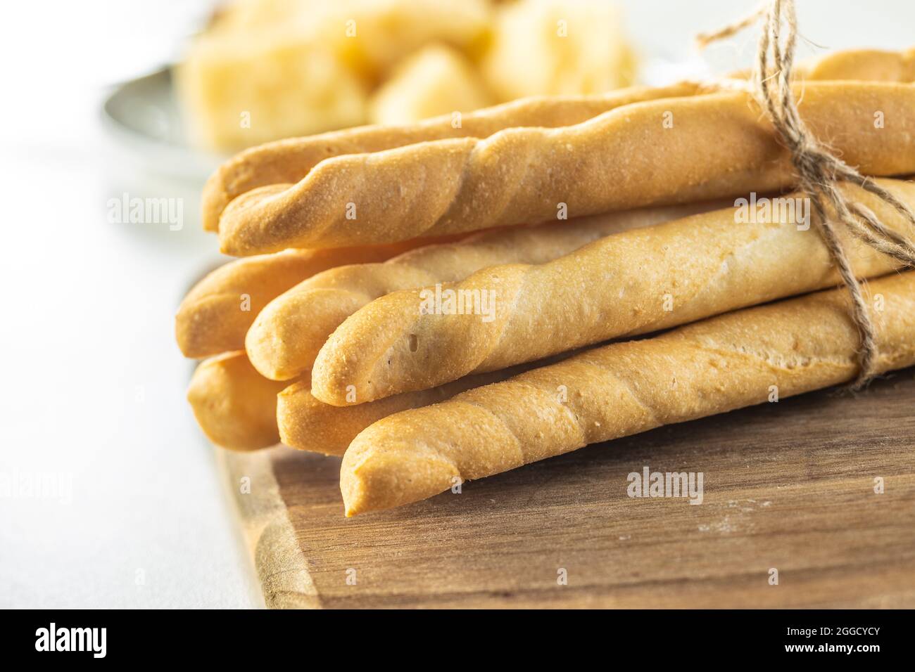 Grissini sticks. Traditional italian bread sticks on cutting board ...