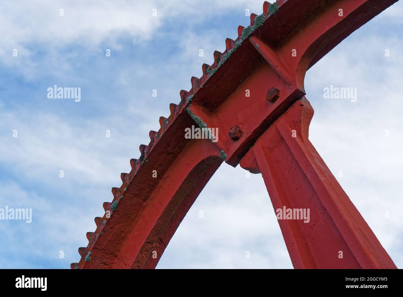 Giant cog wheel, a relic of mining days, west coast, New Zealand Stock ...