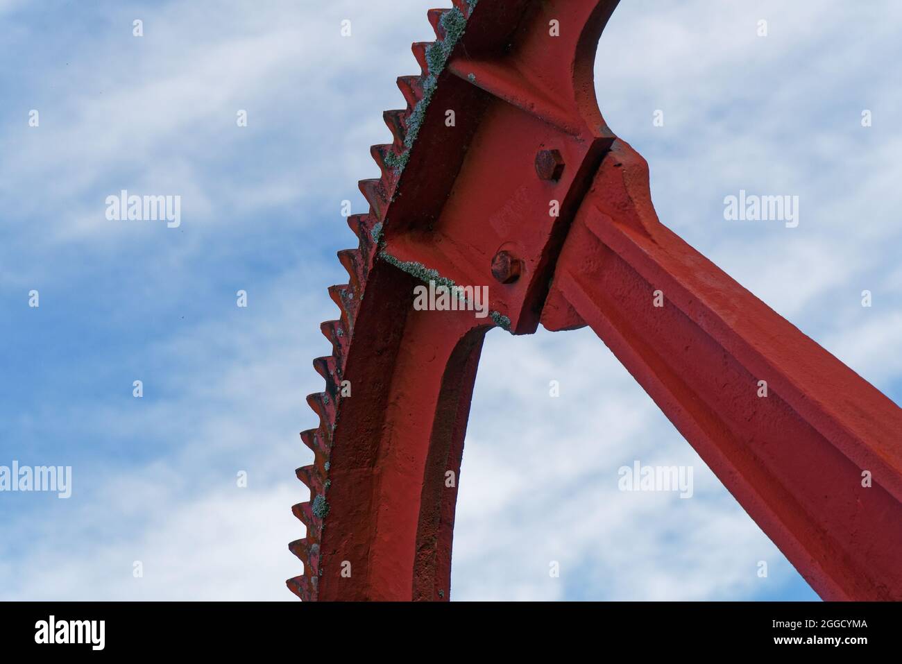 Giant cog wheel, a relic of mining days, west coast, New Zealand Stock ...
