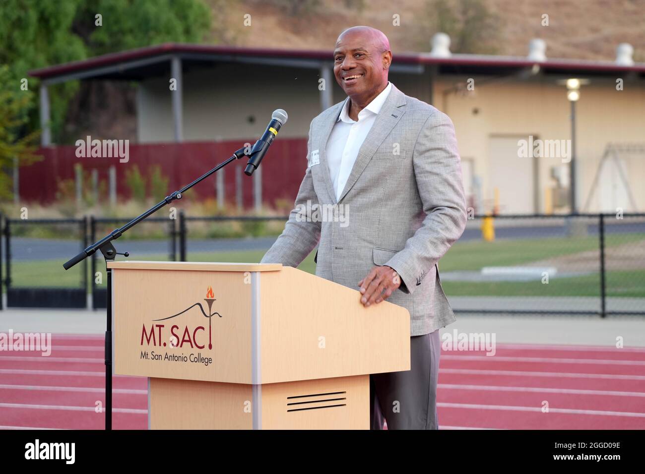 Mike Powell (USA) speaks at a ceremony to commemorate the 30th ...
