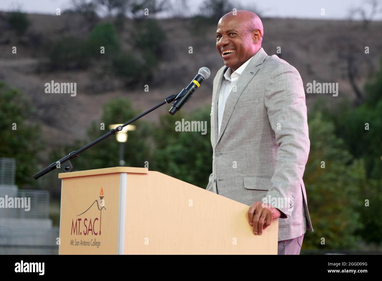 Mike Powell (USA) speaks at a ceremony to commemorate the 30th ...