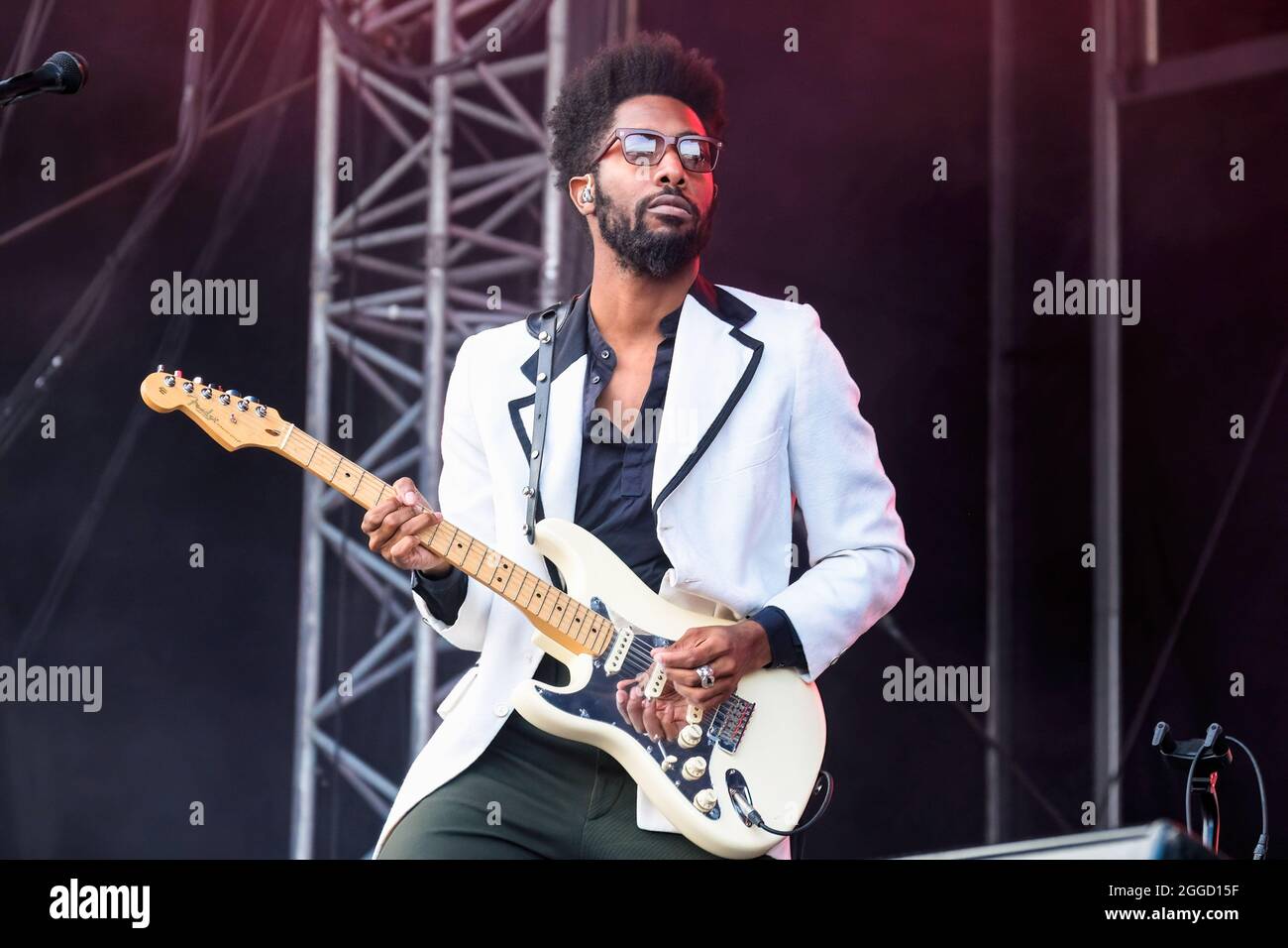 Guitarist Dom John with Indie band, Miles Kane performs live on stage ...