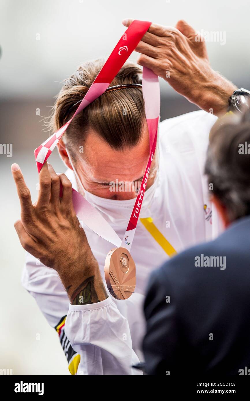 Paralympian athlete Roger Habsch celebrates on the podium after winning ...