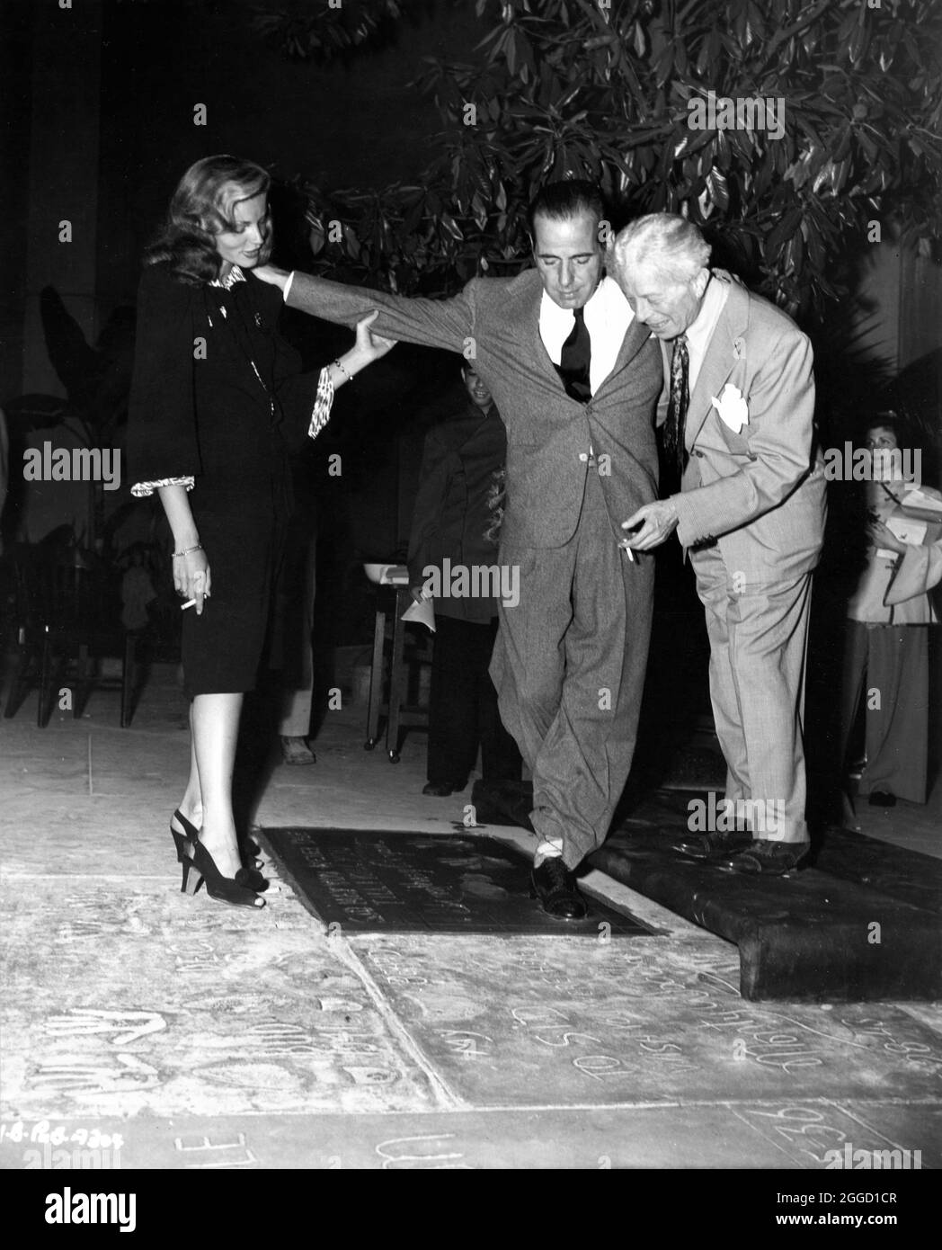 LAUREN BACALL HUMPHREY BOGART and SID GRAUMAN at the Forecourt Ceremony ...