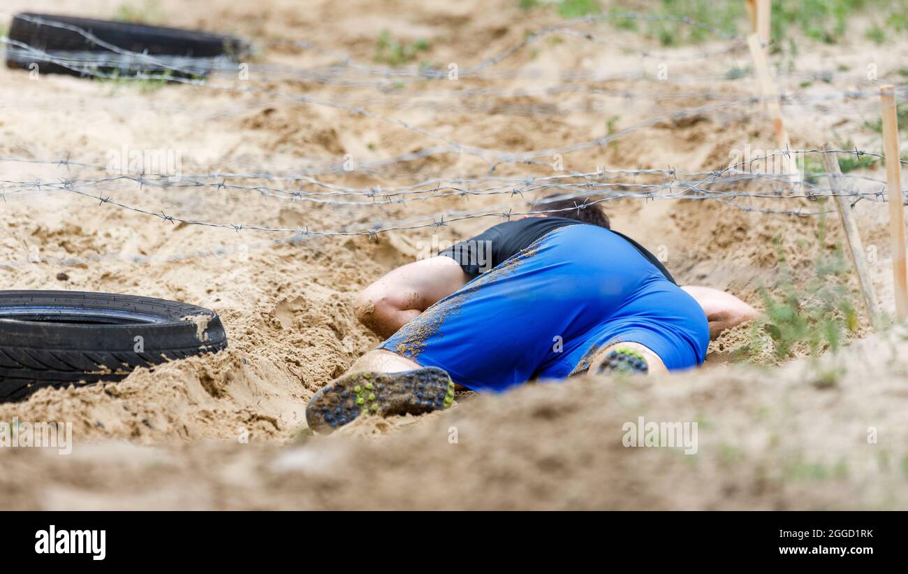 Man crawling sand hi-res stock photography and images - Alamy