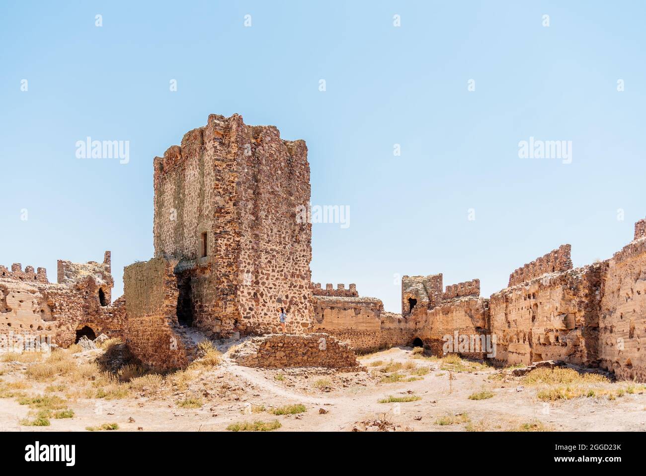 Restored stone tower in the middle of a medieval castle Stock Photo - Alamy
