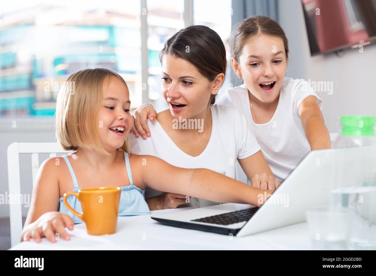 Cheerful woman two daughters hi-res stock photography and images - Alamy