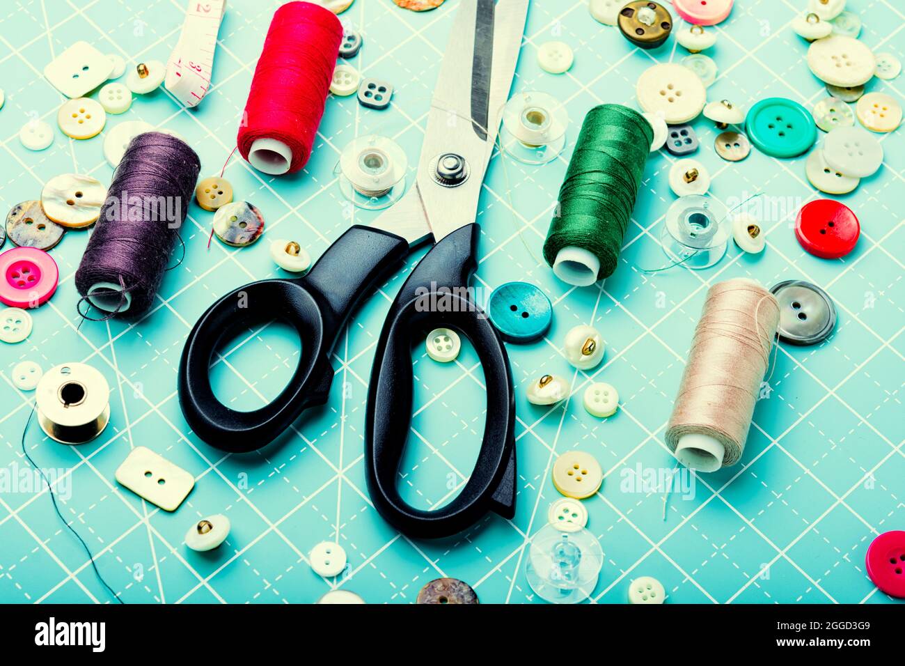 Sewing kit,thread,scissor and buttons.Sewing background,accessories for ...