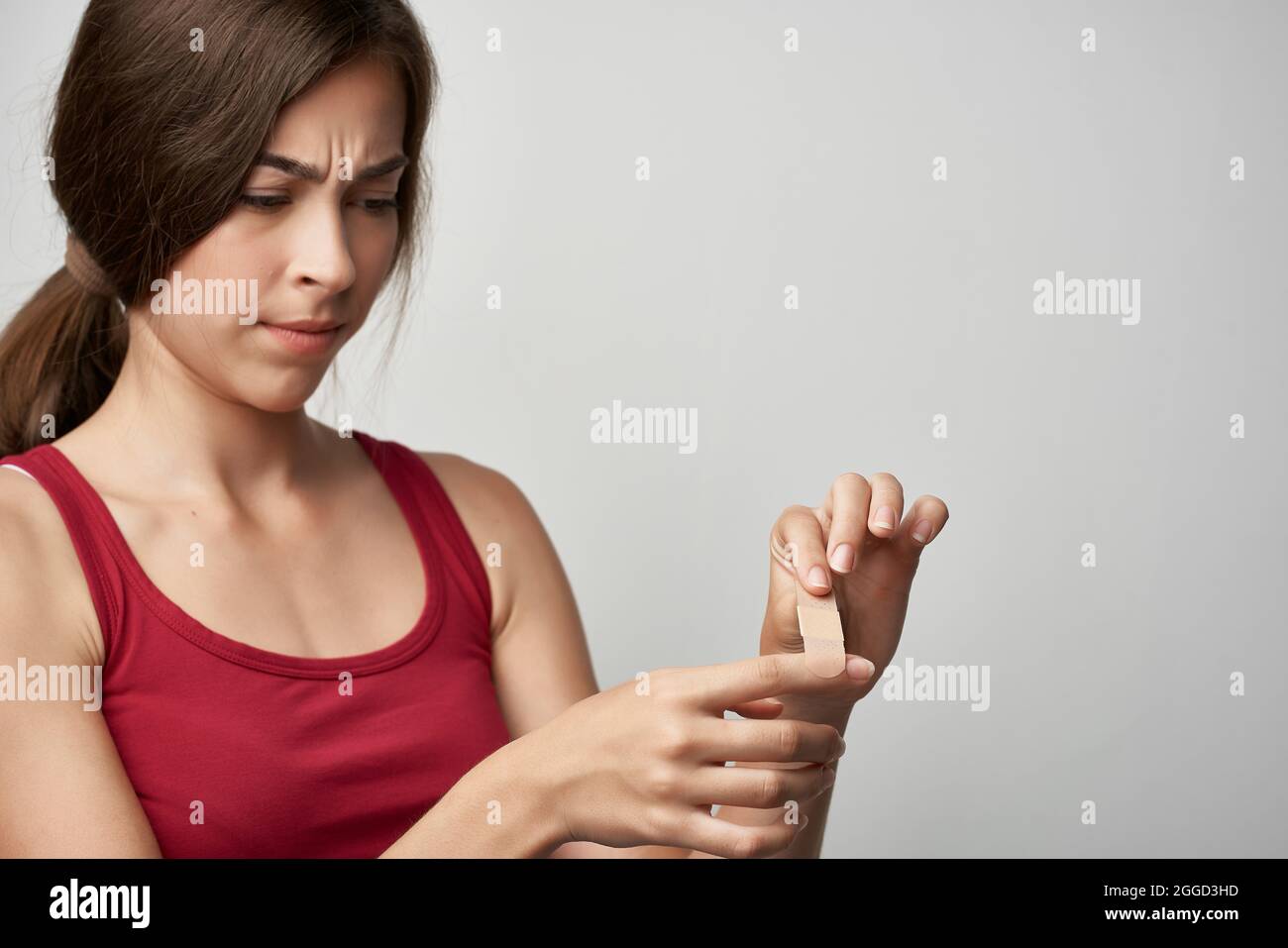woman cheating finger with plaster health problems injury Stock Photo ...