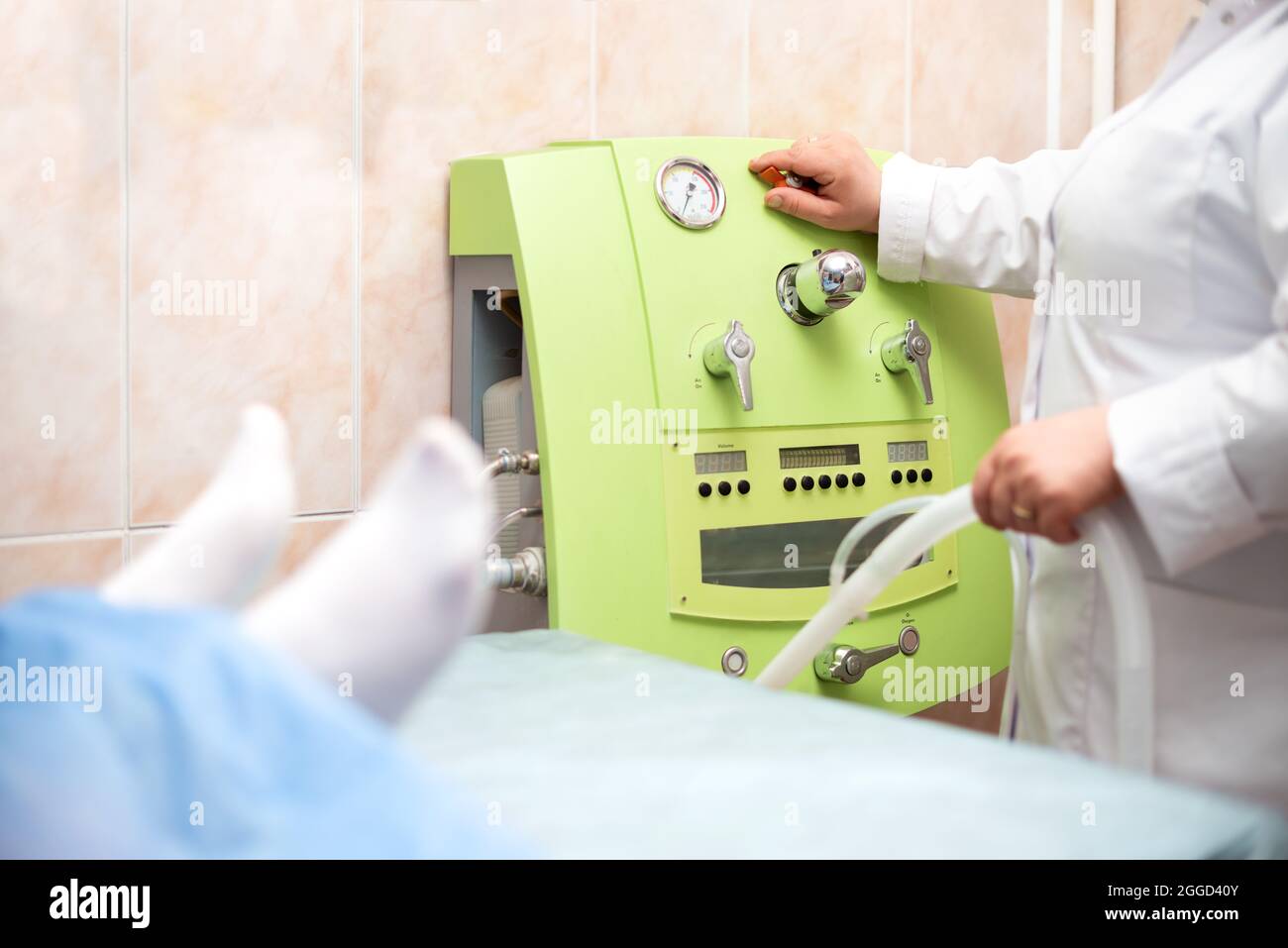 Doctor's hands, a device for cleaning the rectum in the hospital for ...