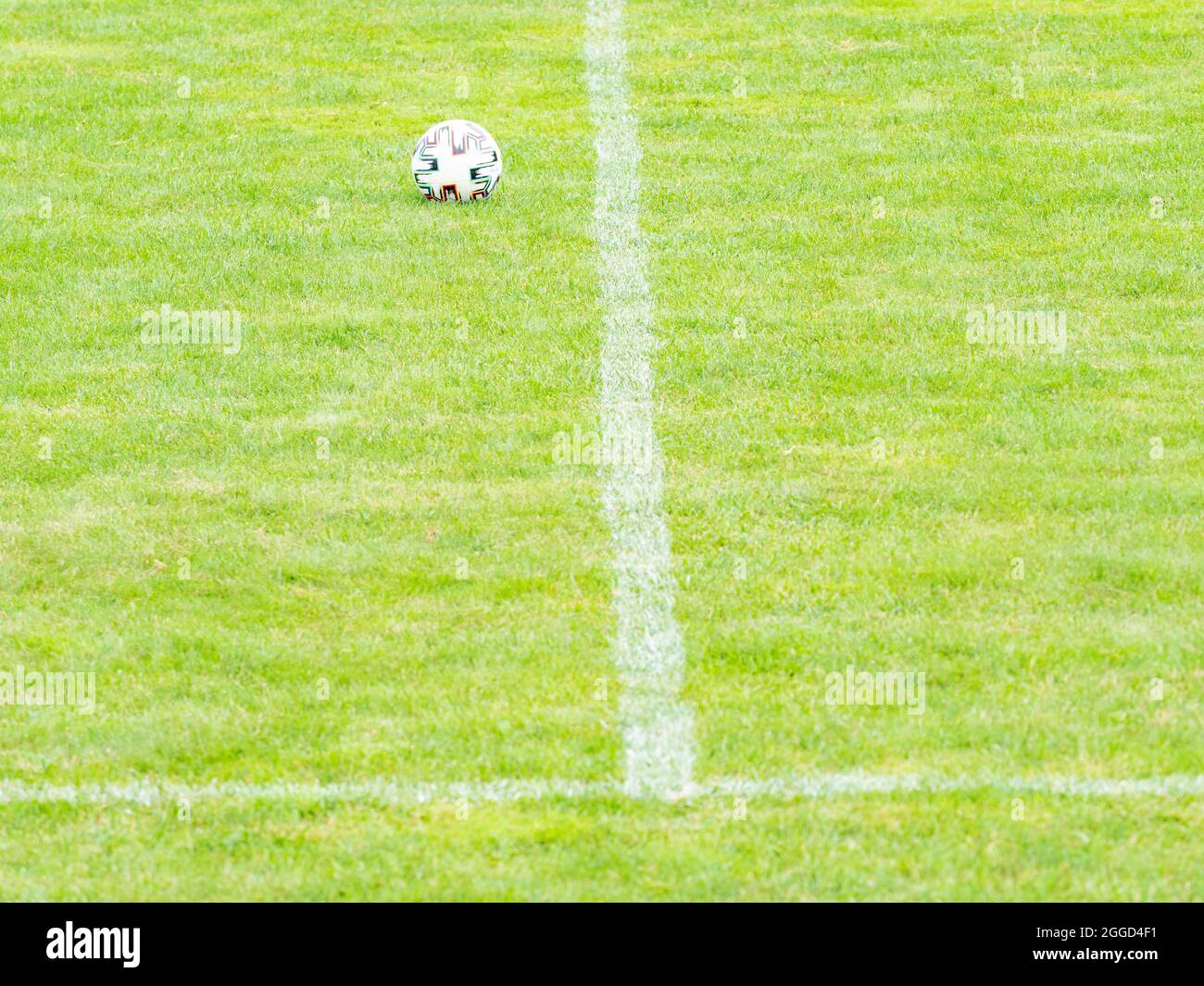 The football playground line with ball outdoor. Low grass playground ...