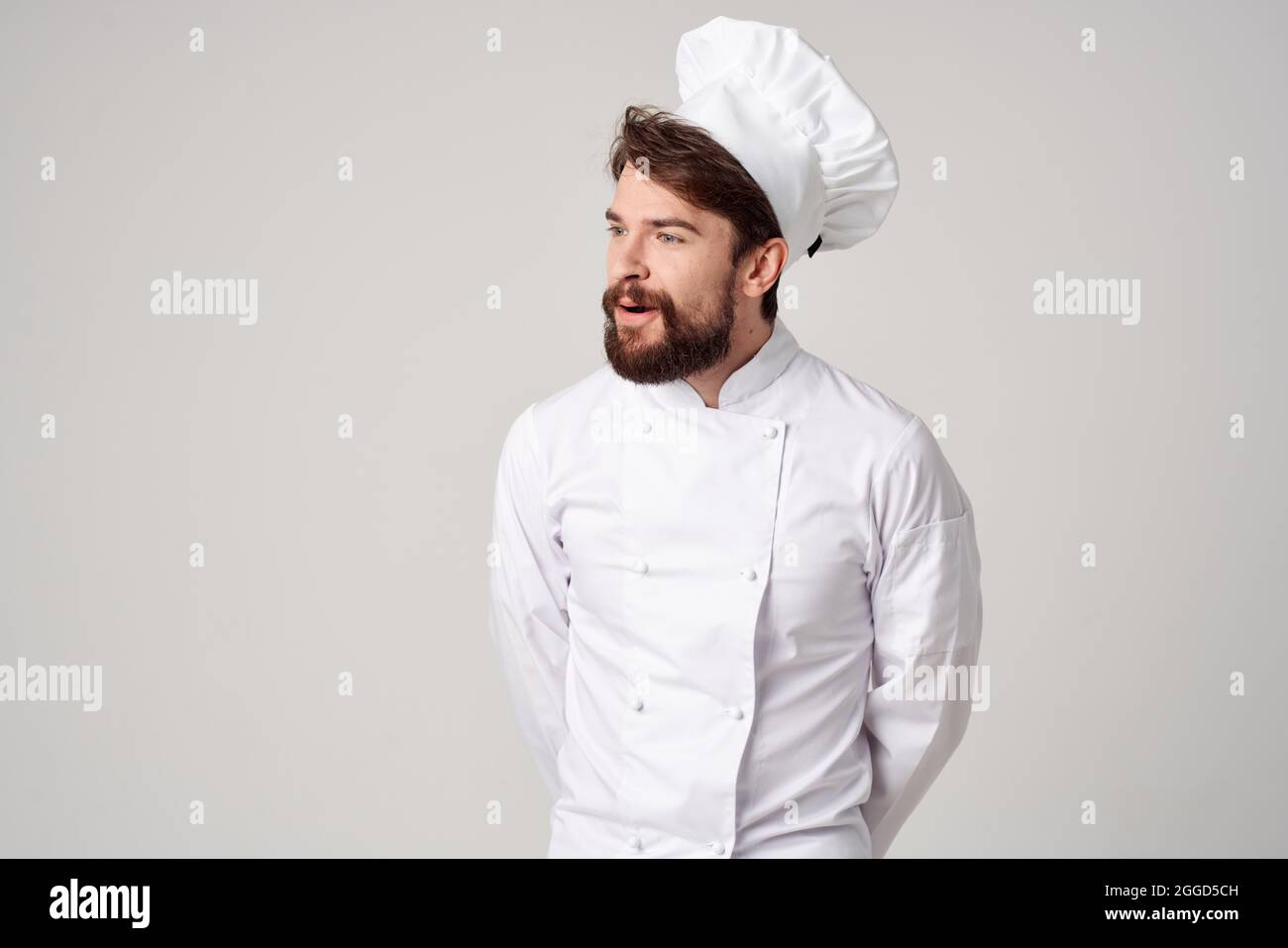 male cook Chef uniform Cooking emotions gourmet posing studio Stock ...