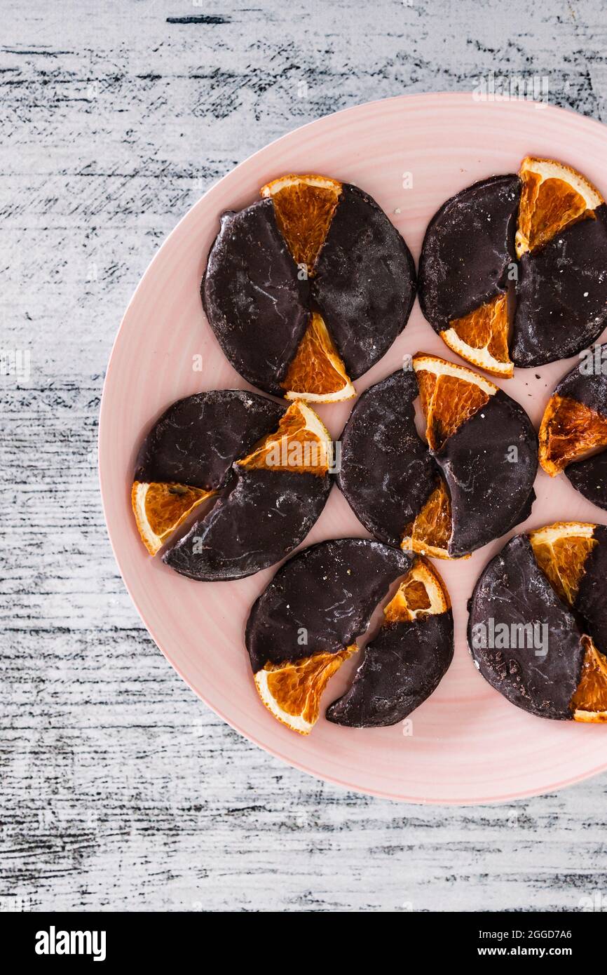 dehydrated orange slices covered in dark chocolate, healthy plant-based ...