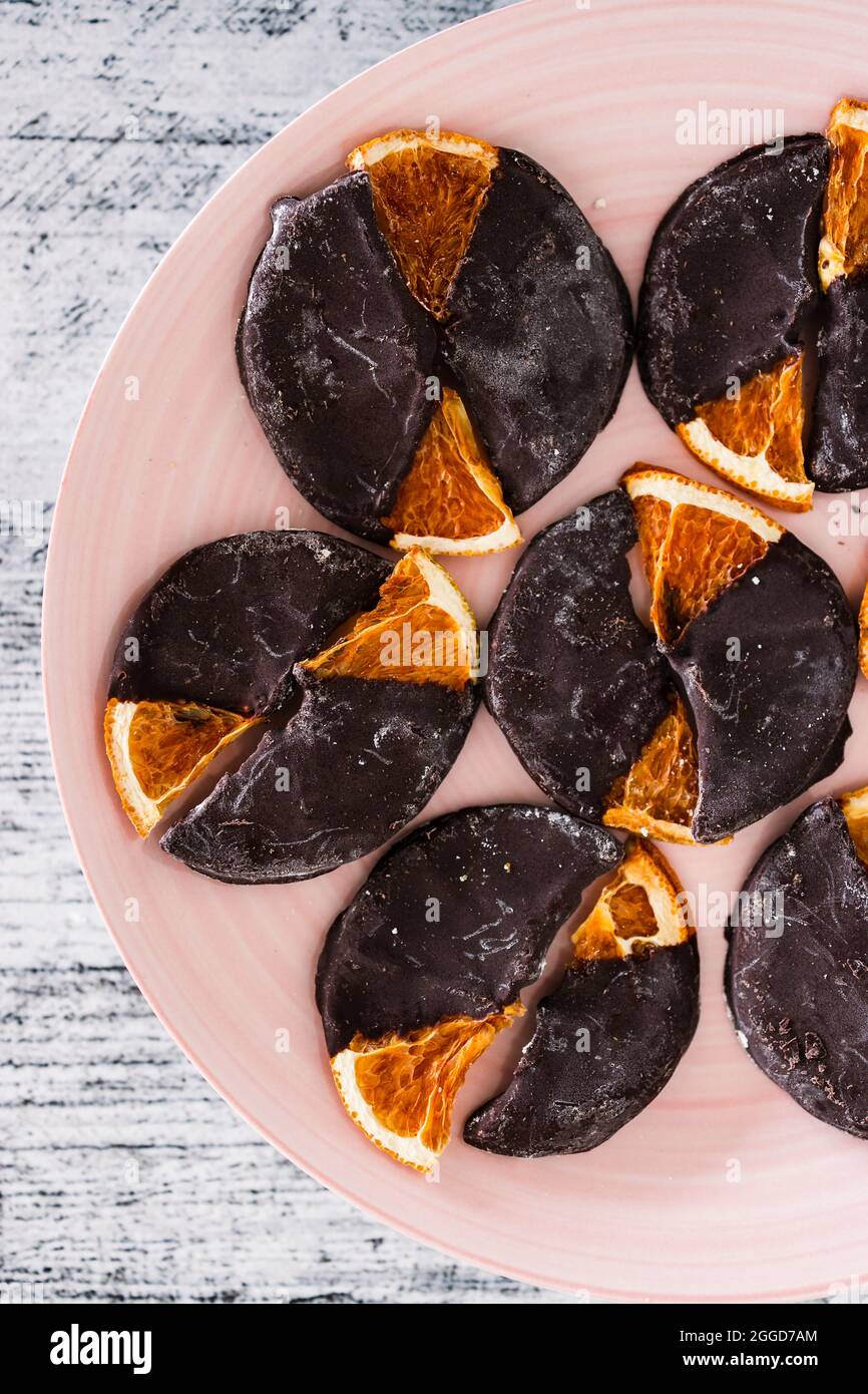 dehydrated orange slices covered in dark chocolate, healthy plant-based ...