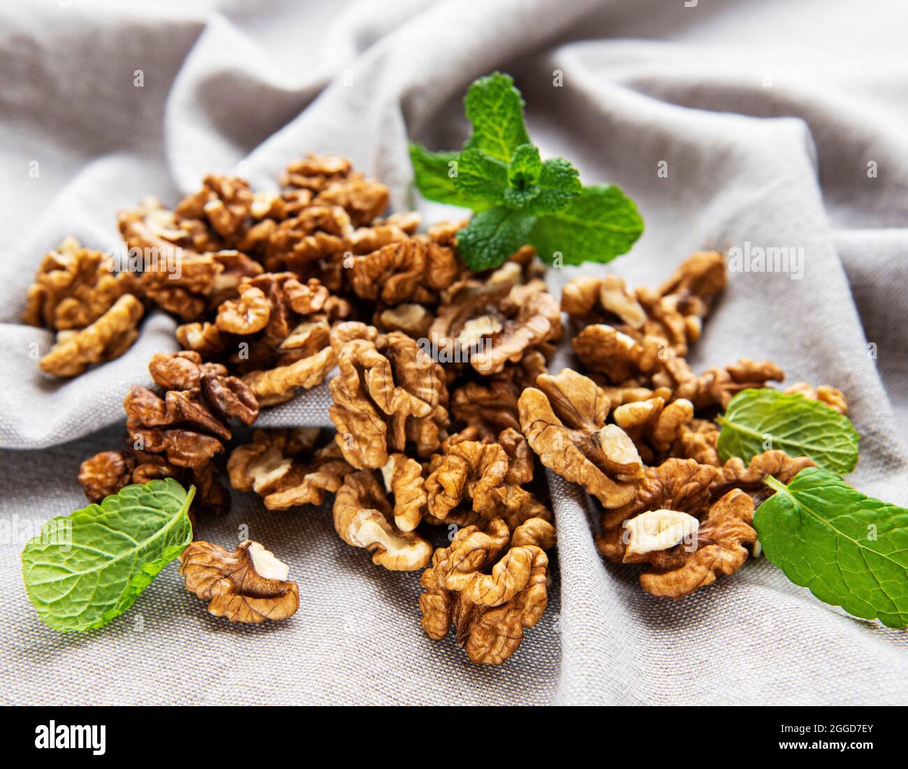 Walnuts without shell on a concrete background Stock Photo - Alamy