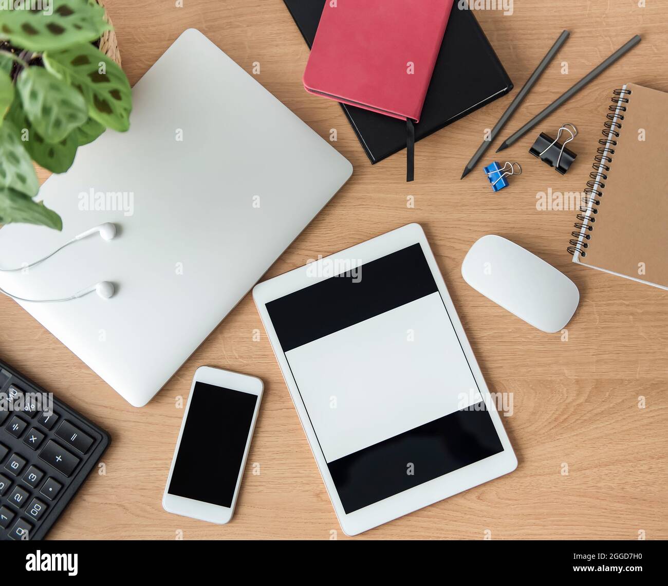 Office workplace with laptop on wooden table Stock Photo - Alamy