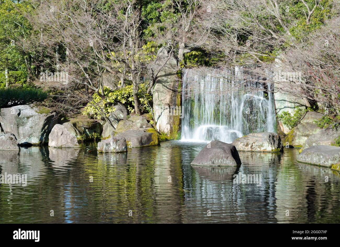 Beautiful scenery of a waterfall surrounded by cliffs in Japan Stock ...