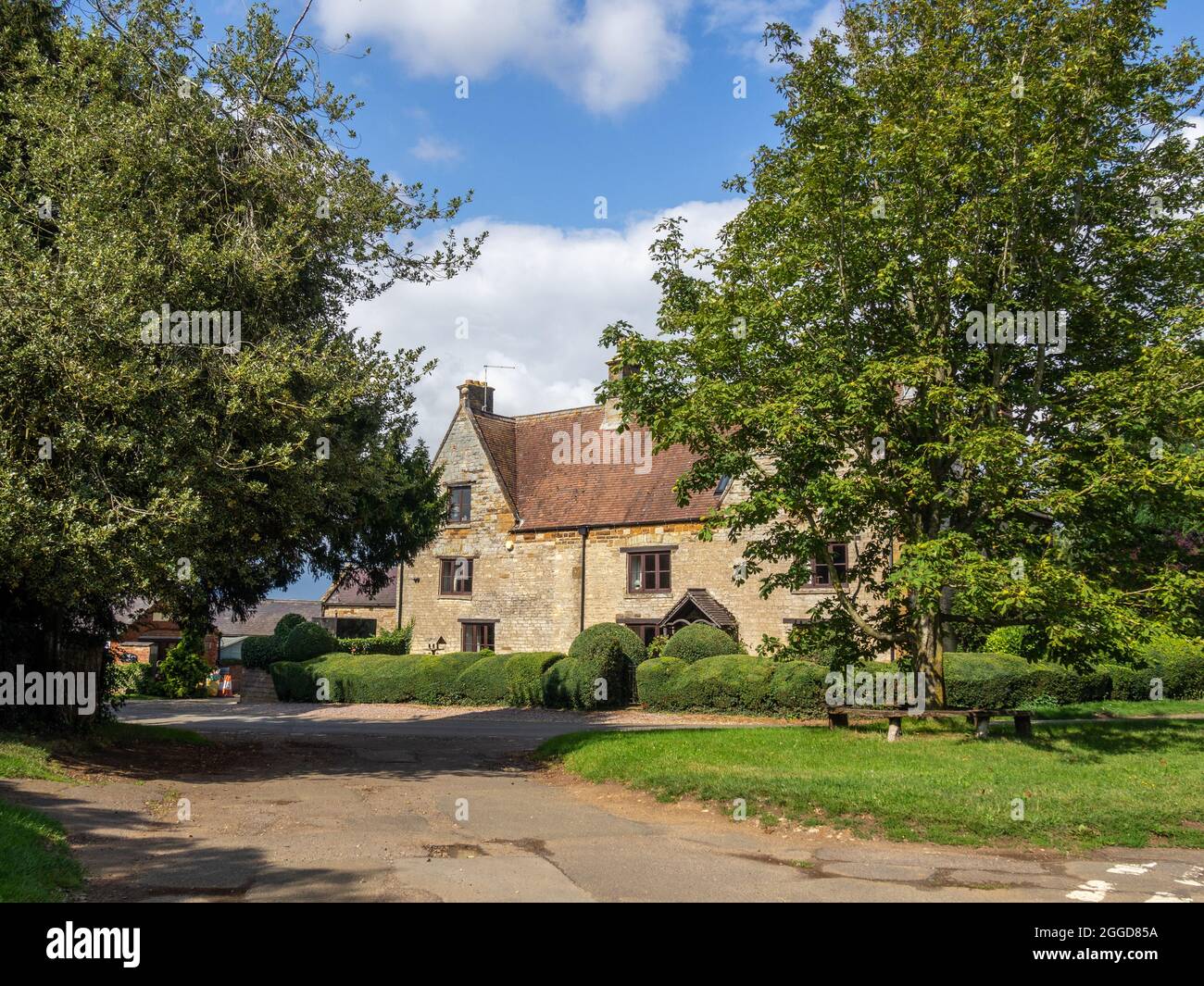 Summer street scene in the pretty village of Upper Stowe ...