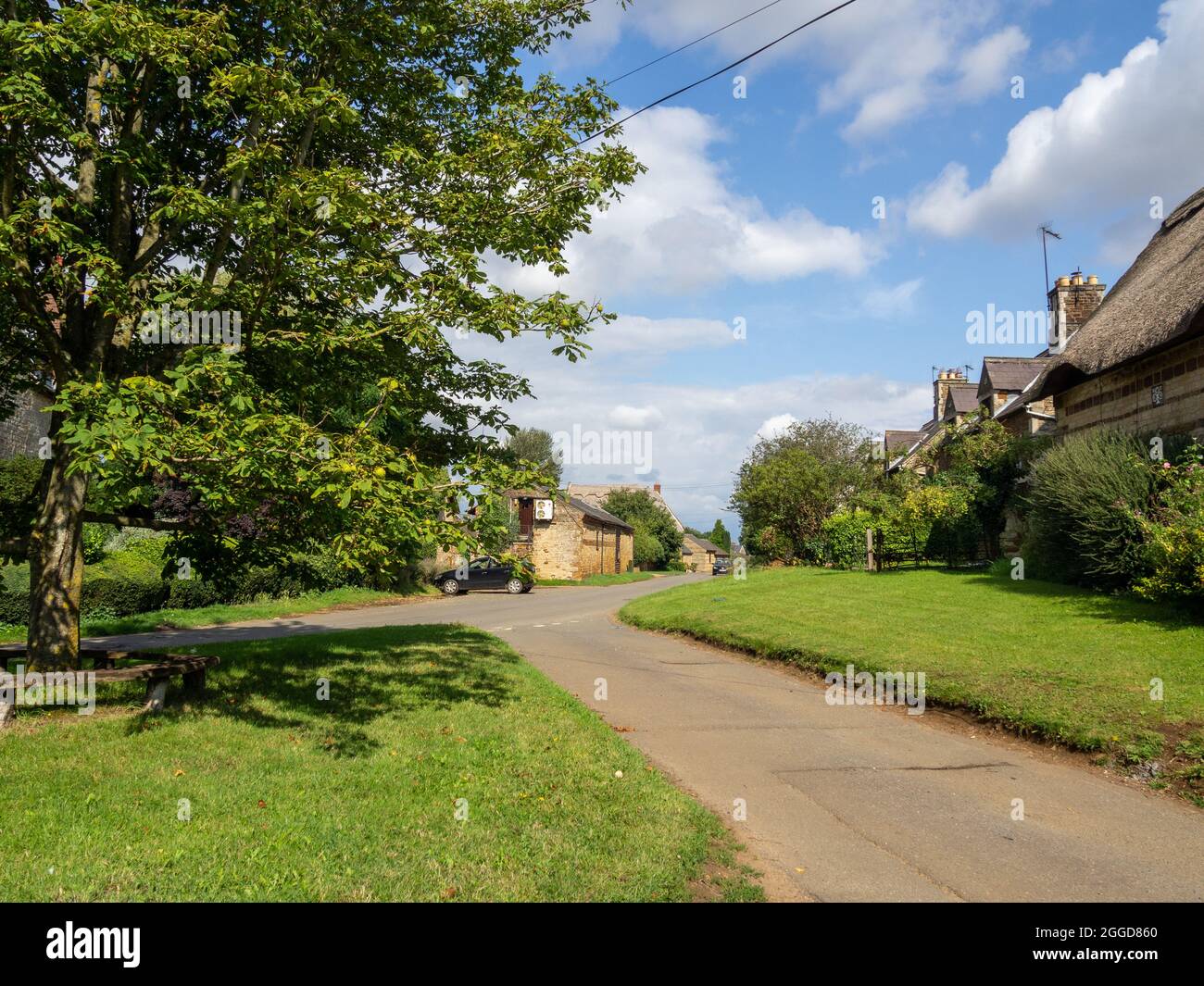 Summer street scene in the pretty village of Upper Stowe ...