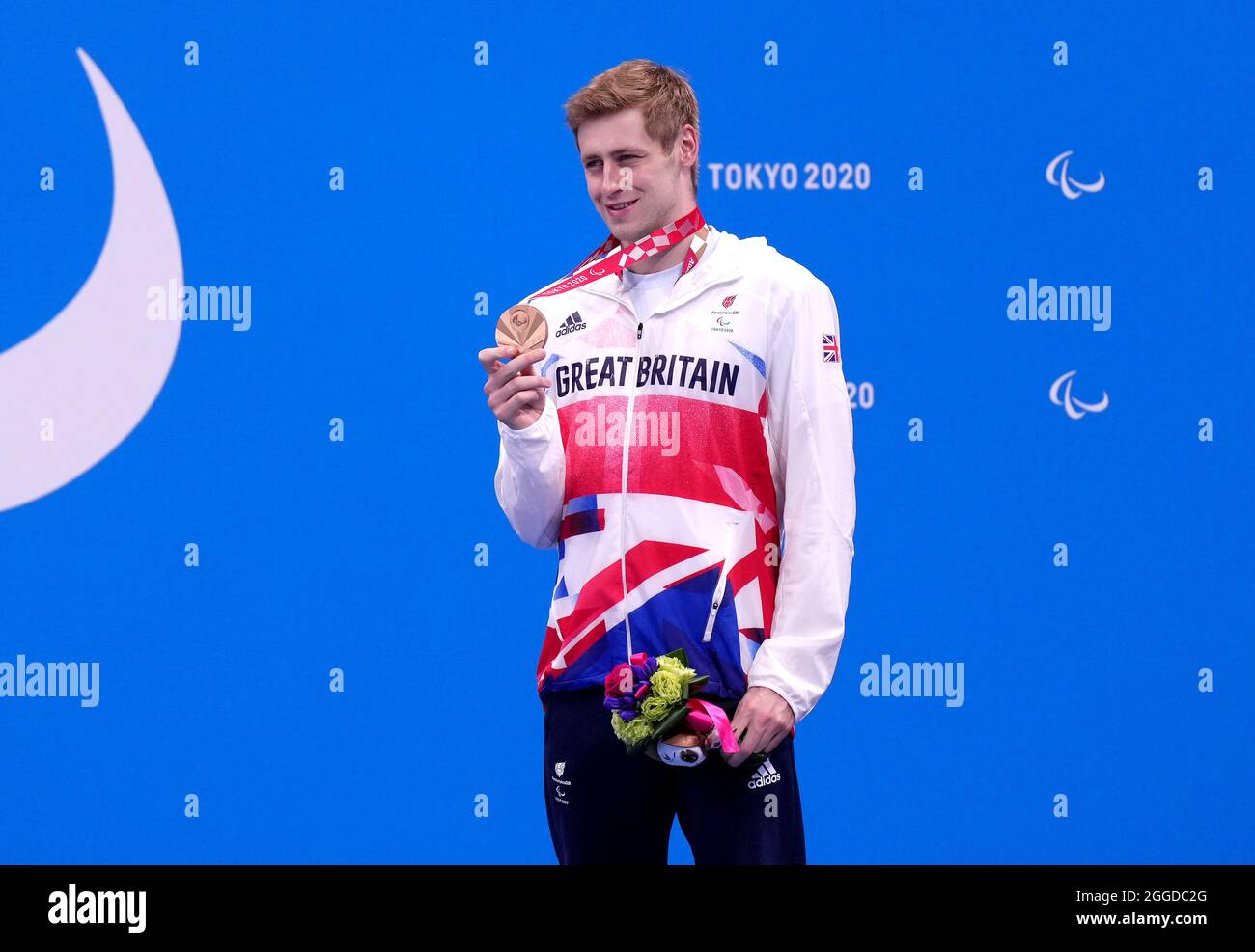 Great Britain's Stephen Clegg celebrates with the bronze medal in the ...