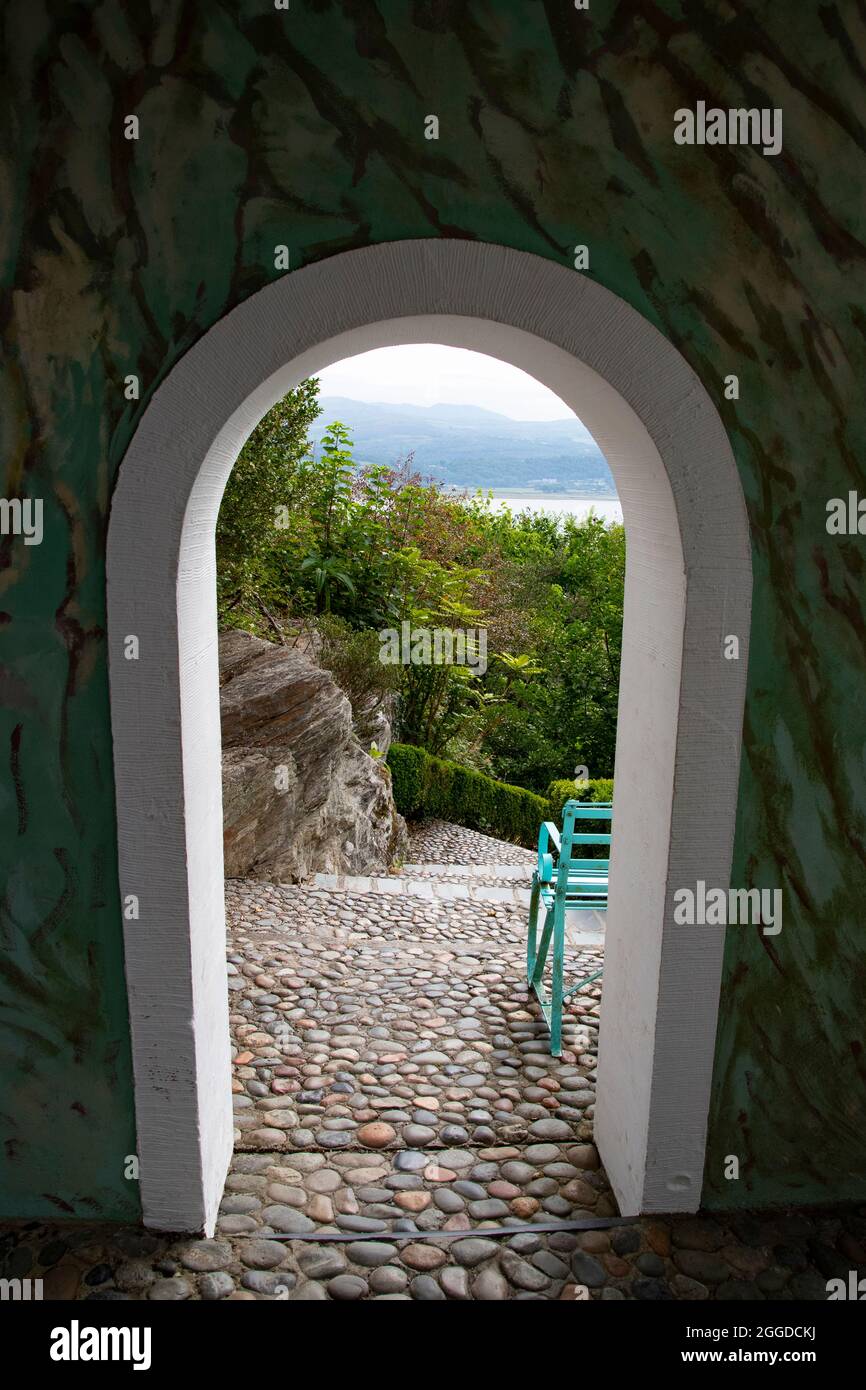 Stone Garden arch with cobbled path at Portmerion Italian village in ...