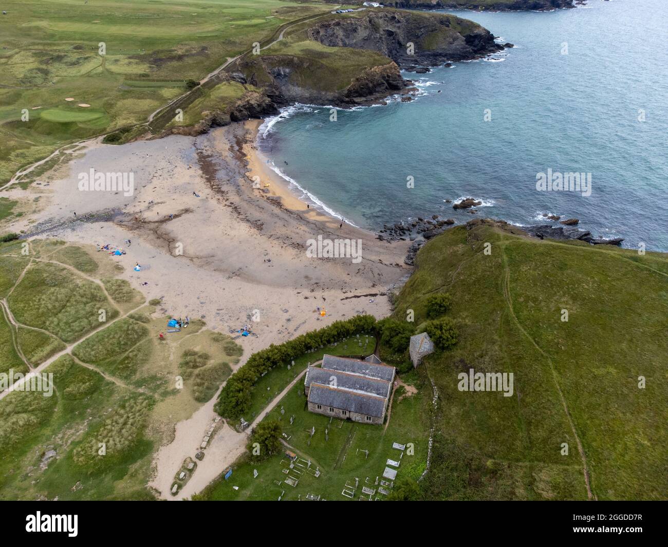aerial drone around church cove and mullion golf course cornwall uk ...