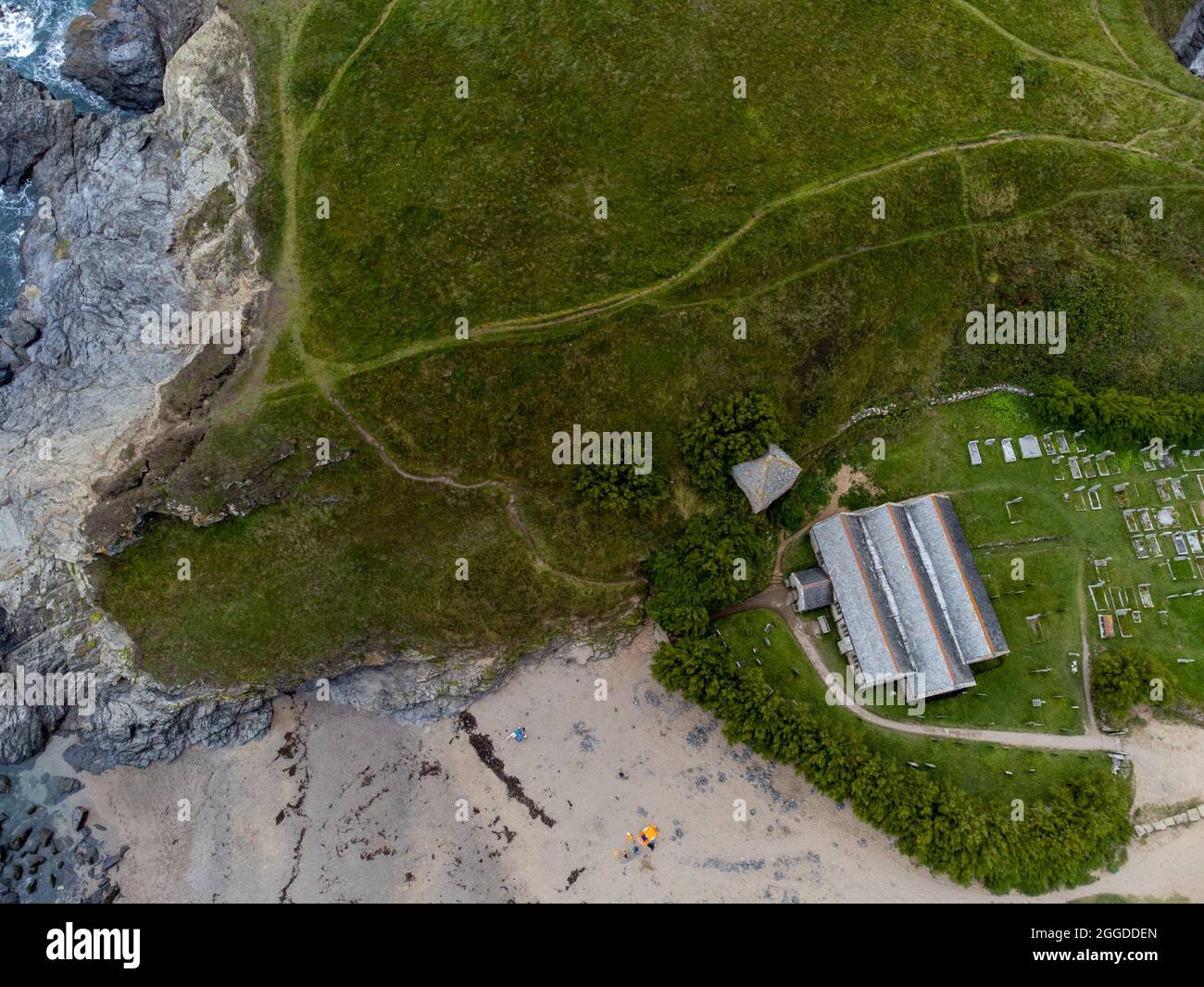 aerial drone around church cove and mullion golf course cornwall uk ...