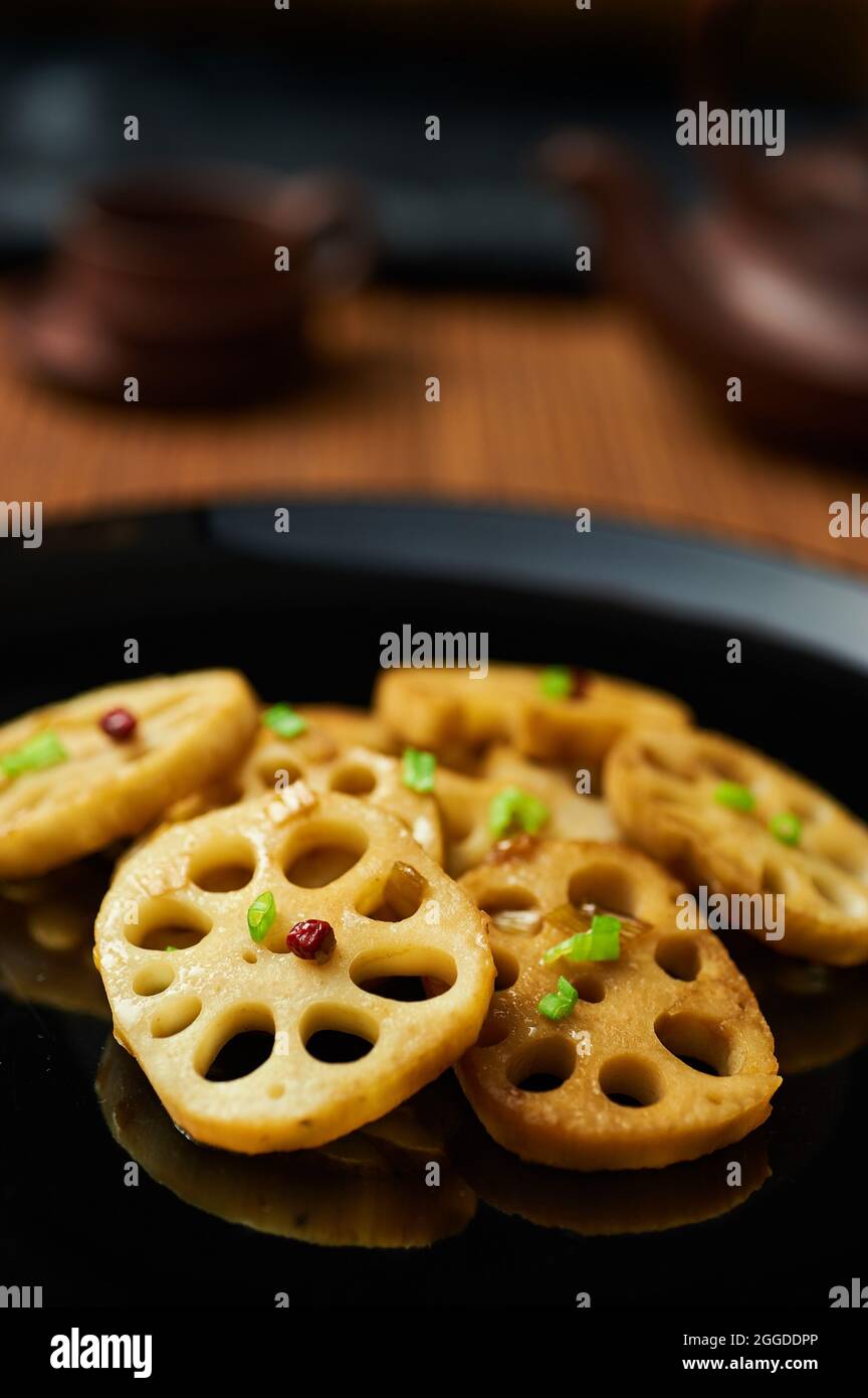 Roasted lotus roots, Italy, Europe Stock Photo - Alamy