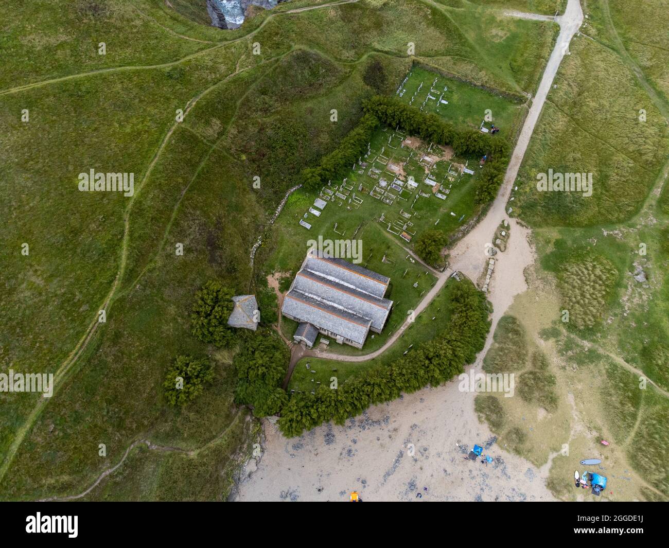 aerial drone around church cove and mullion golf course cornwall uk ...