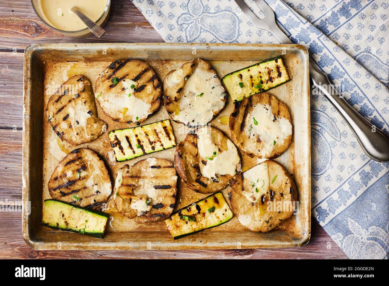 Grilled seitan, marinated zuchini, thaine sauce,Italy, Europe Stock ...