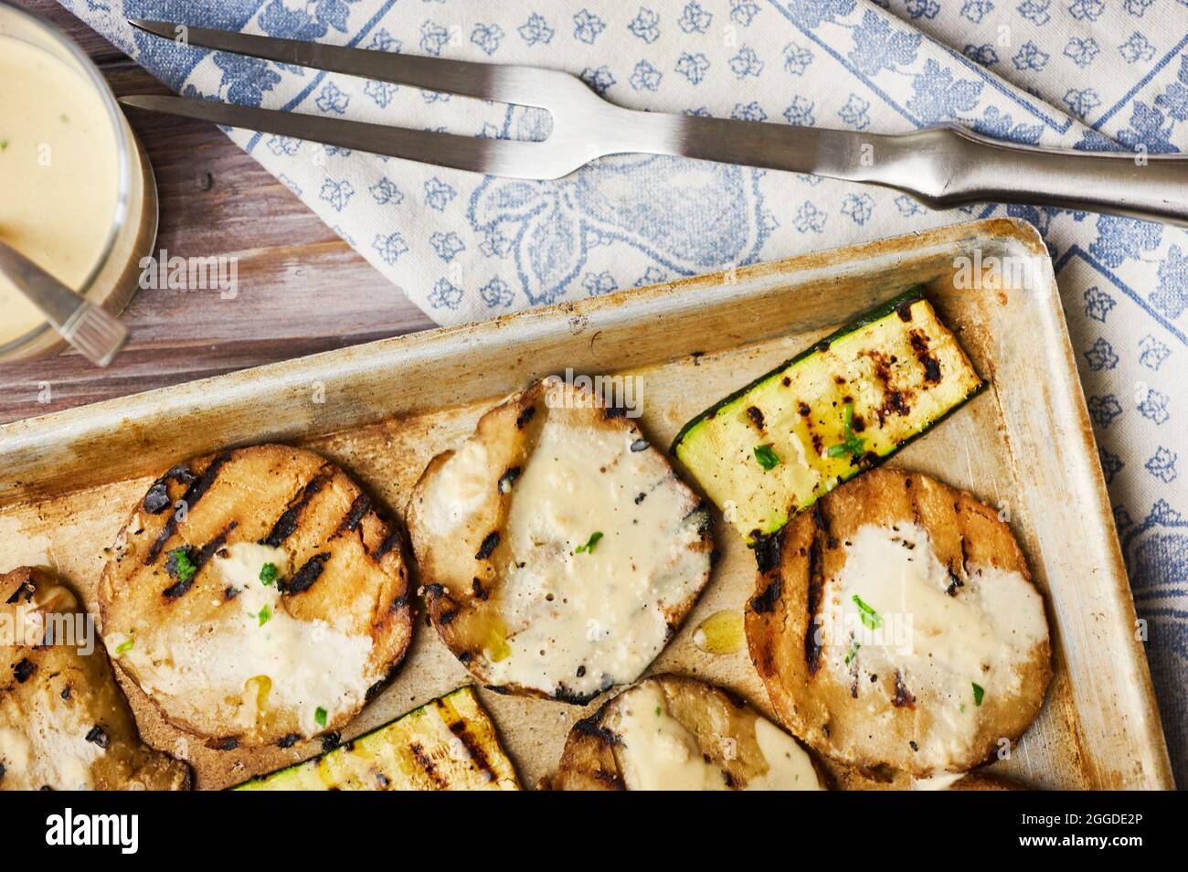 Grilled seitan, marinated zuchini, thaine sauce,Italy, Europe Stock ...