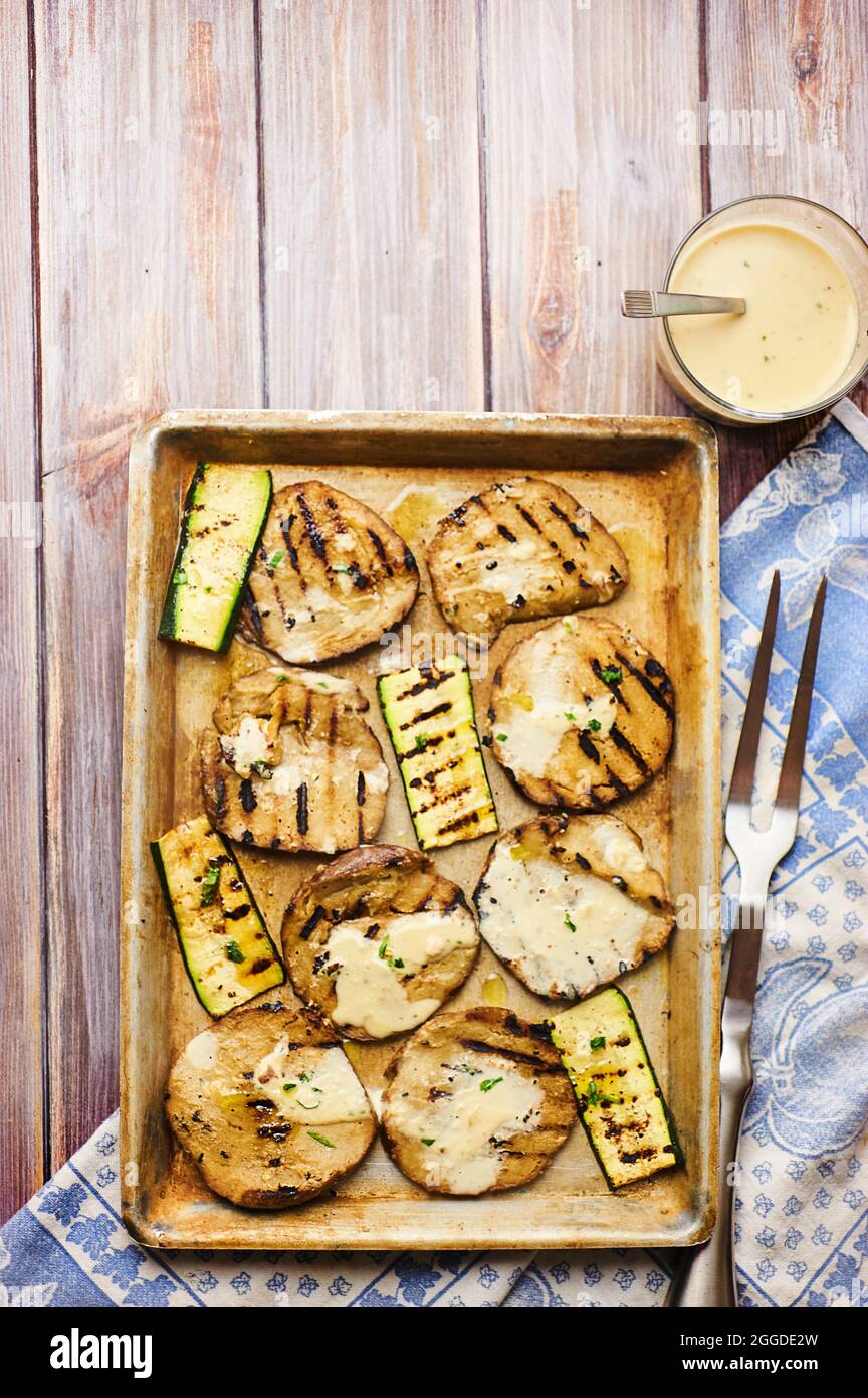 Grilled seitan, marinated zuchini, thaine sauce,Italy, Europe Stock ...