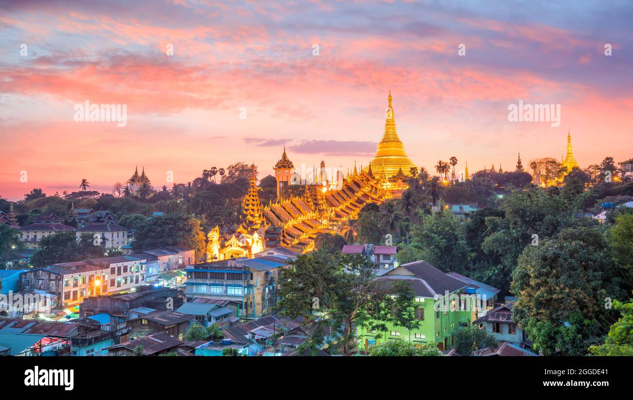 Yangon skyline with Shwedagon Pagoda in Myanmar at sunset Stock Photo ...