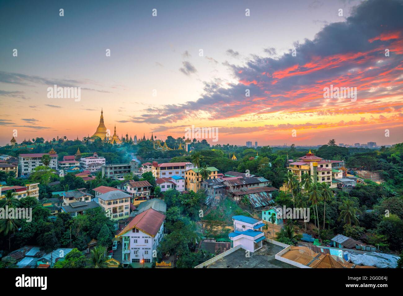 Yangon skyline with Shwedagon Pagoda in Myanmar at sunset Stock Photo ...