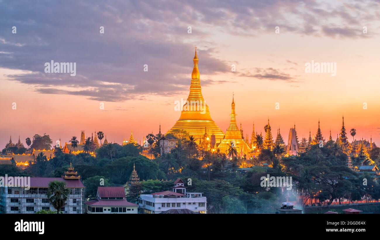 Yangon skyline with Shwedagon Pagoda in Myanmar at sunset Stock Photo ...