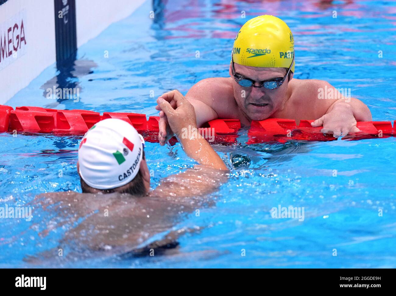 Mexico's Arnulfo Castorena (left) celebrates winning the gold medal ...