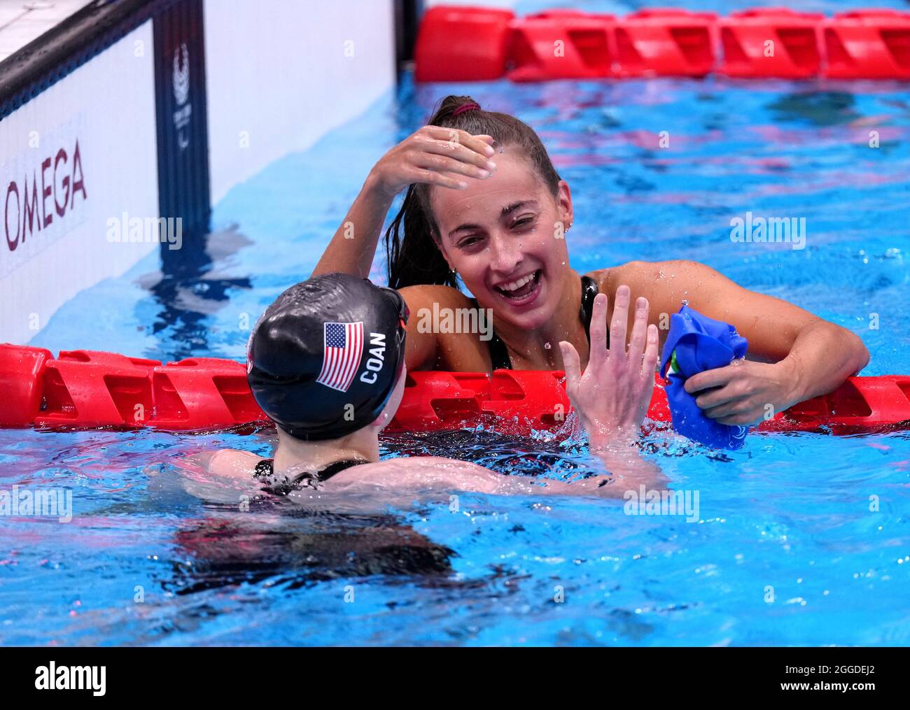 Italy's Giulia Terzi (right) celebrates winning the gold medal and USA ...