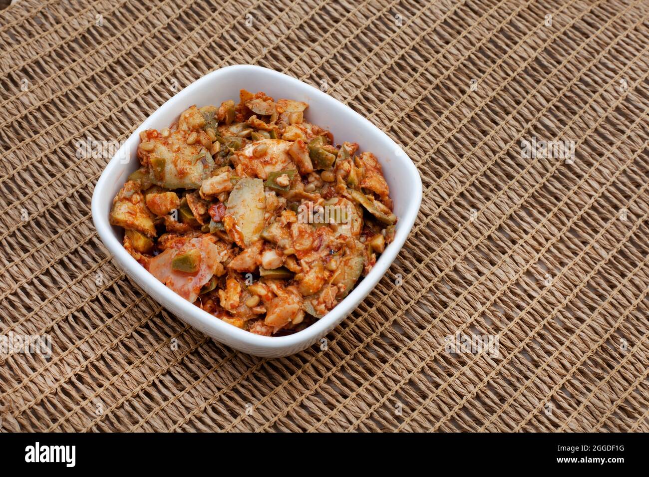 Traditional spicy green mango achar Stock Photo - Alamy