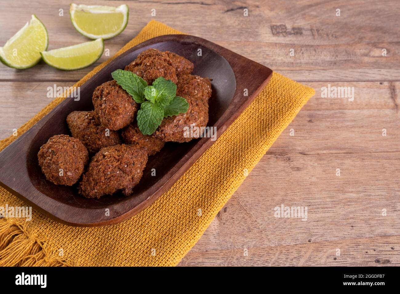 Traditional Arabian fried snack made with wheat and stuffed with minced ...