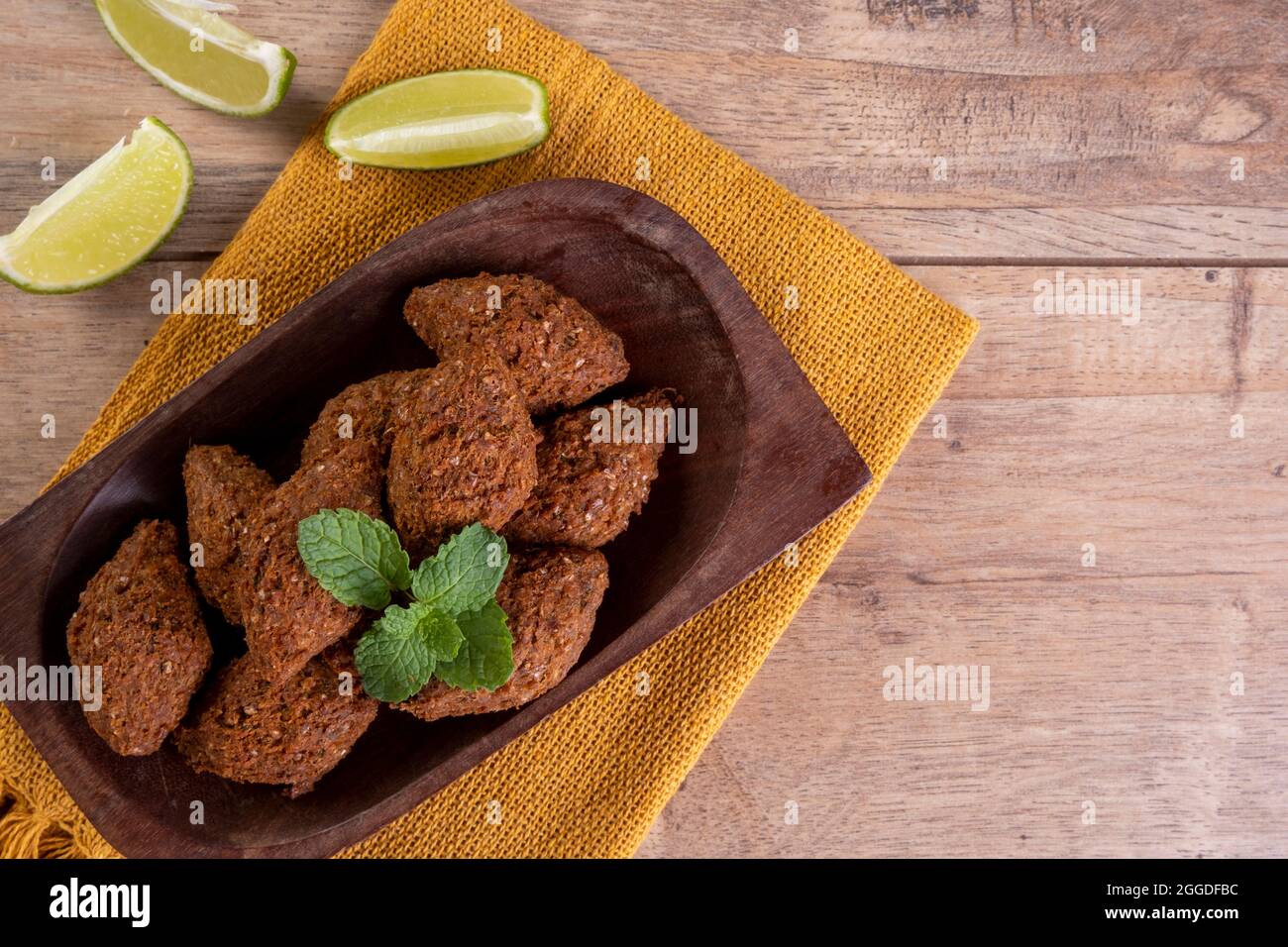 Traditional Arabian fried snack made with wheat and stuffed with minced ...