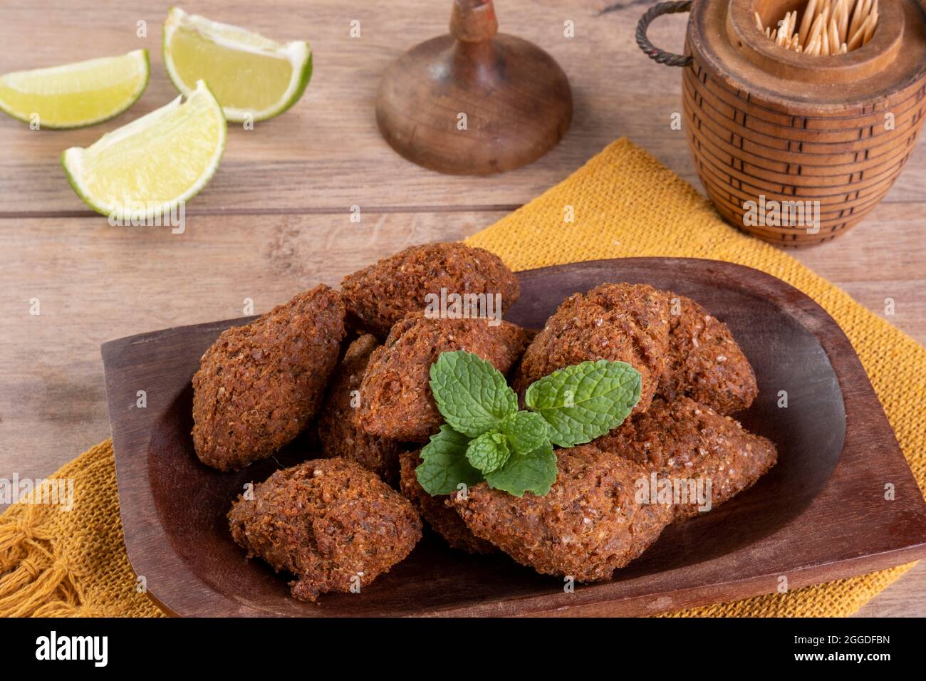 Traditional Arabian fried snack made with wheat and stuffed with minced ...