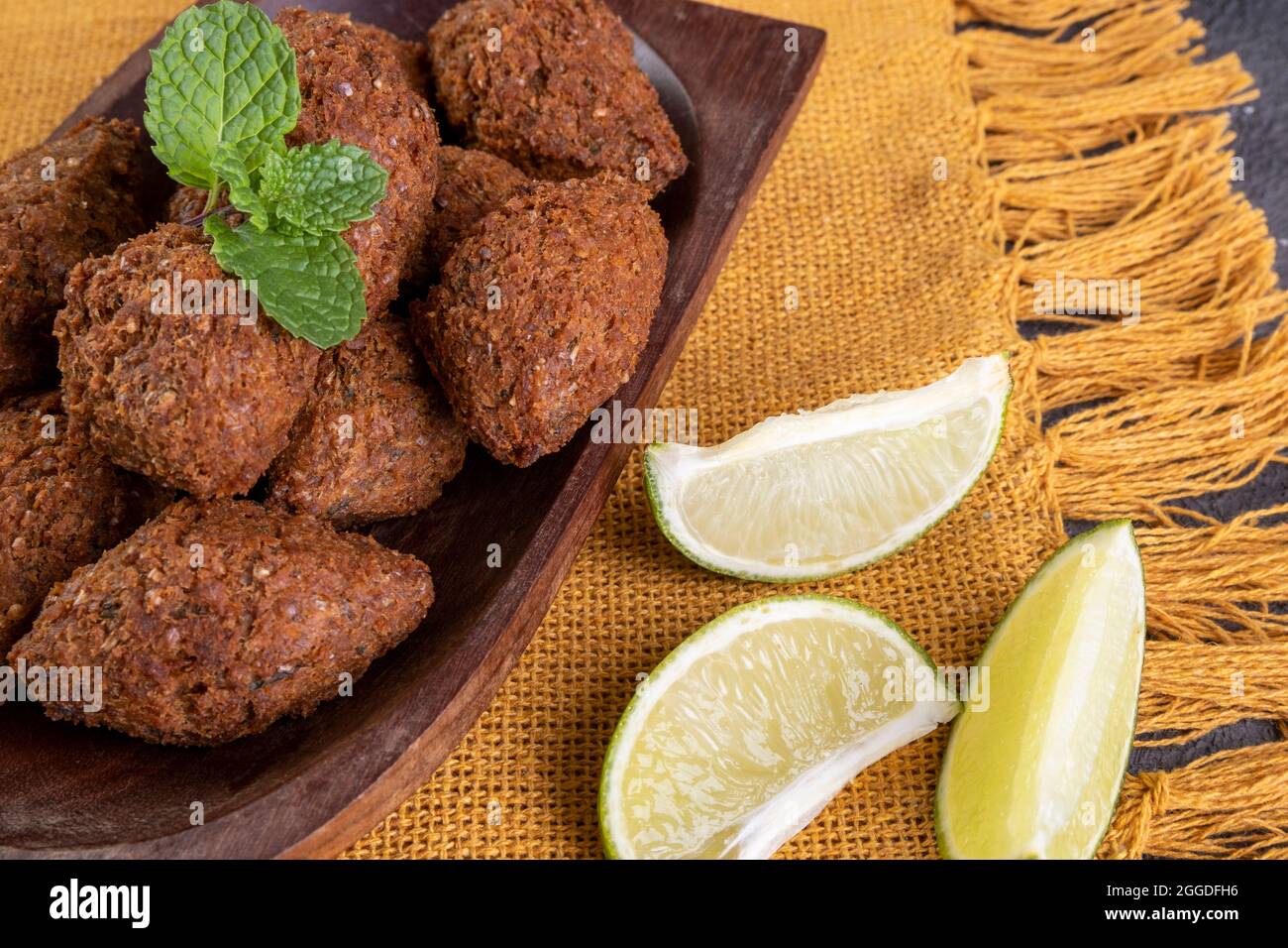 Traditional Arabian fried snack made with wheat and stuffed with minced ...