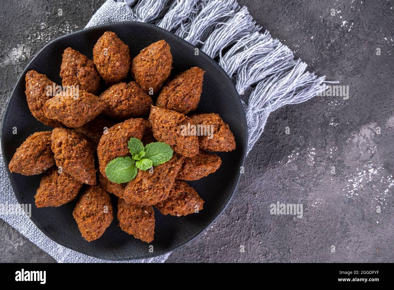 Traditional Arabian fried snack made with wheat and stuffed with minced ...