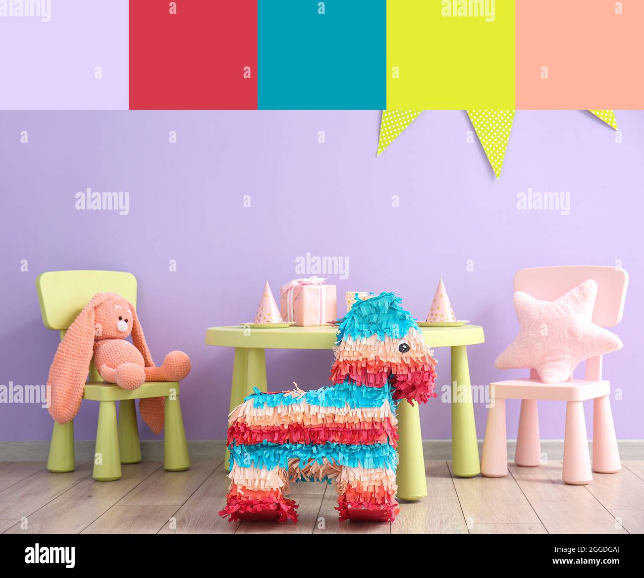Interior of child's room with pinata and toys. Different color patterns ...