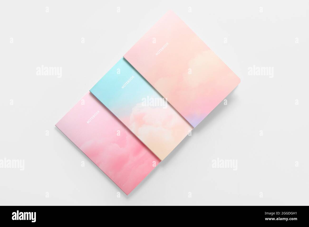 Stylish notebooks on white background Stock Photo - Alamy