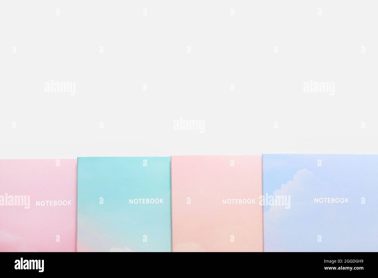 Stylish notebooks on white background Stock Photo - Alamy