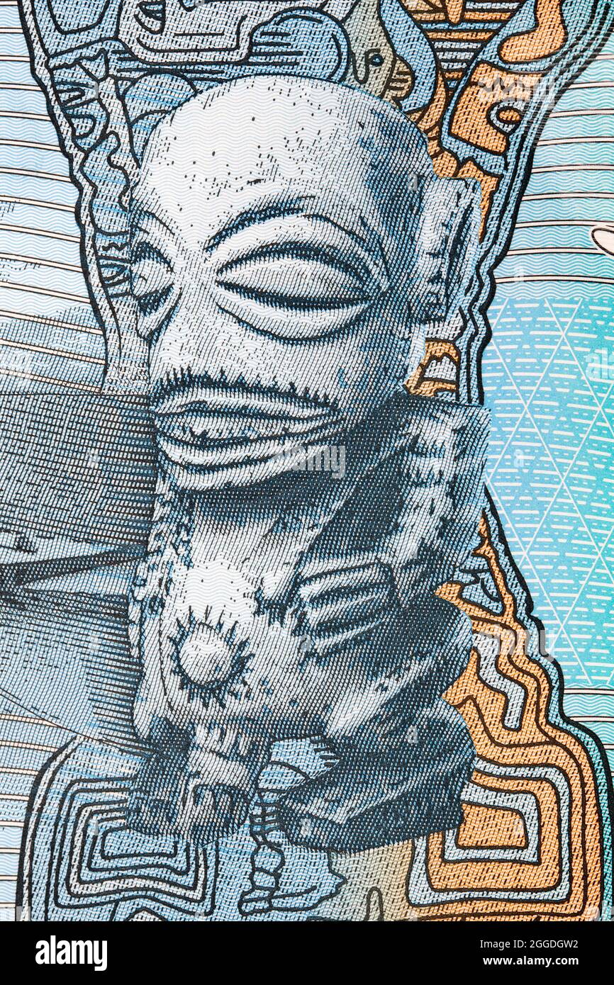 Statue of the god Te-Rengo from Cook Islands money Stock Photo - Alamy